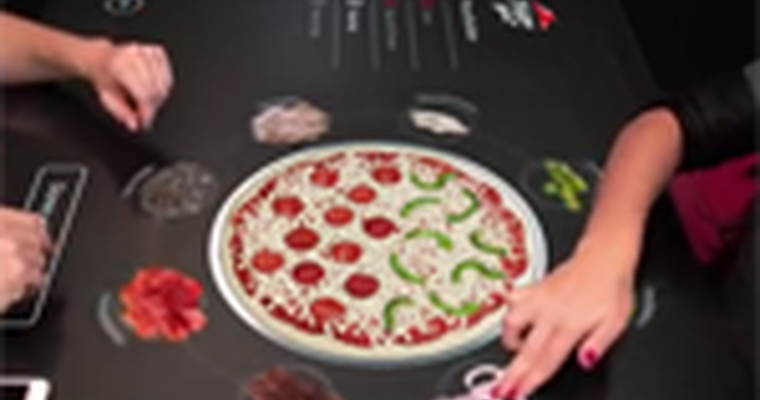 Pizza Hut serves up custom pies on interactive tabletops | Kiosk ...