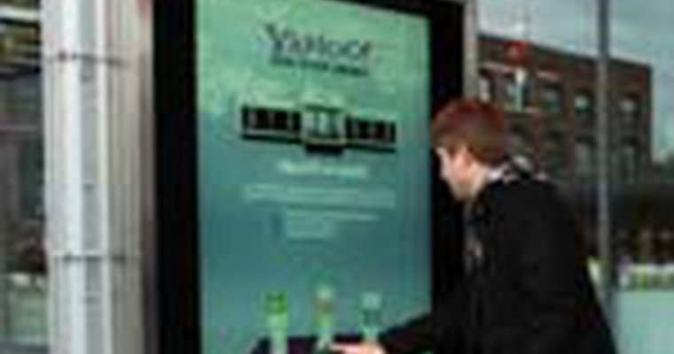 Bus stop wizard: video games and interactive digital signage | Digital ...